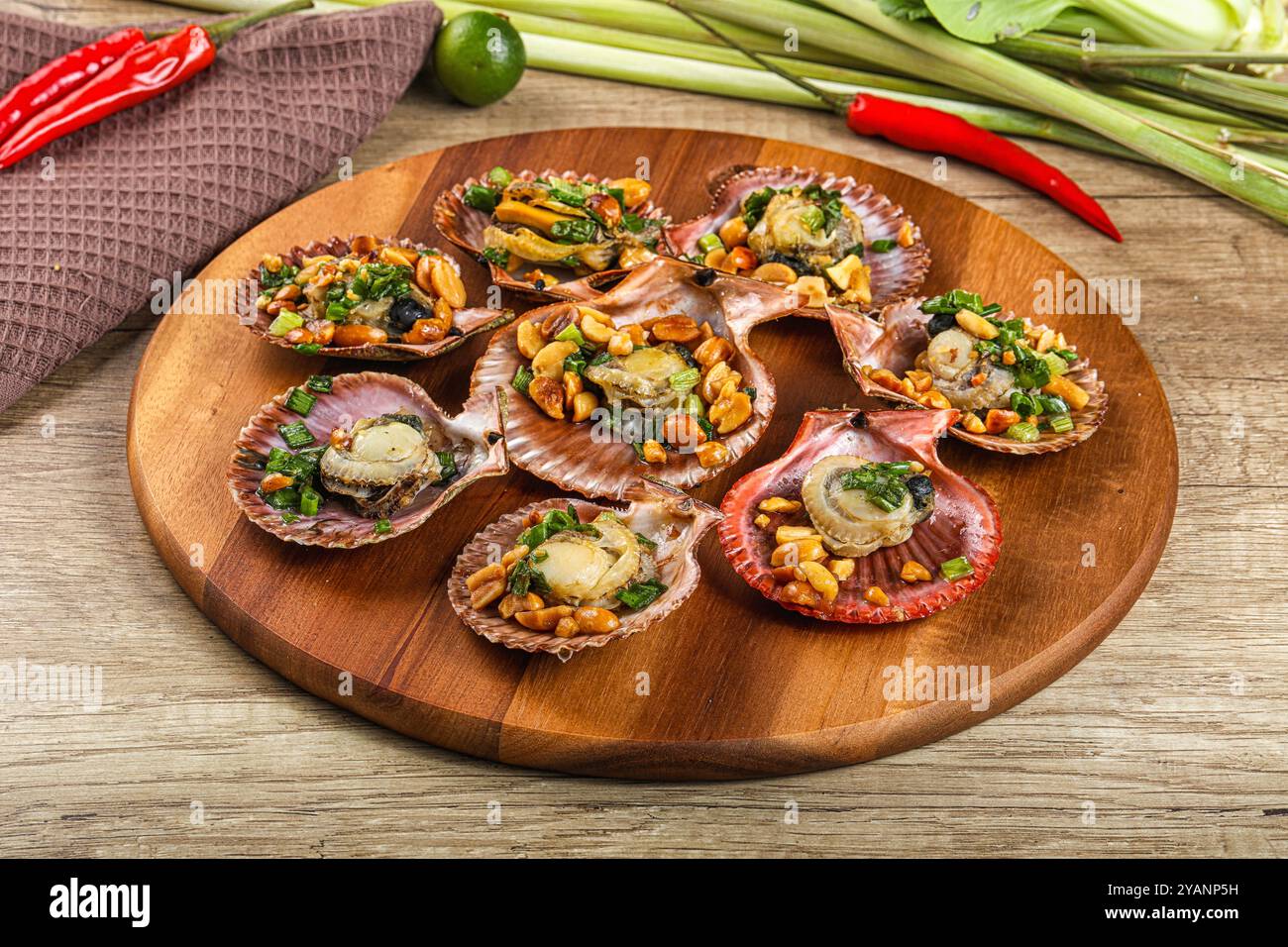 Baked scallops with scalion oil and green onion Stock Photo - Alamy