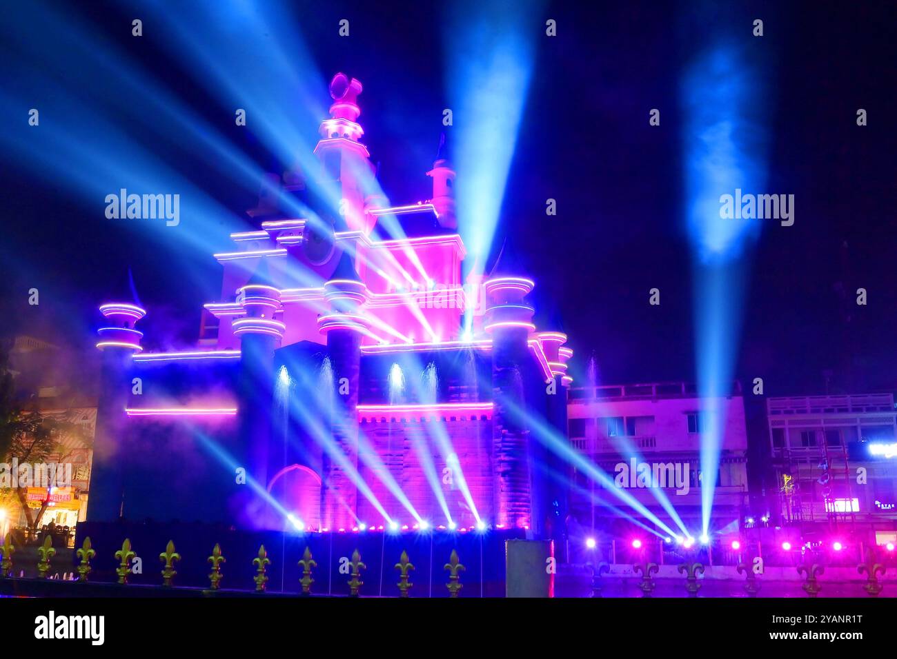 An illuminated "pandal", or temporary platform is seen where the idols ...