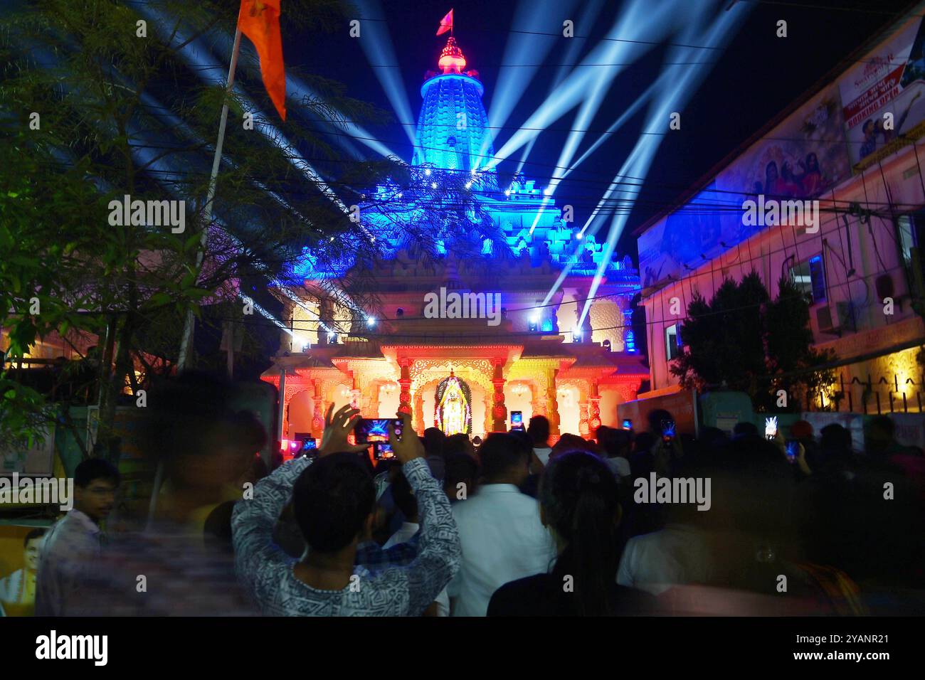 An illuminated "pandal", or temporary platform is seen where the idols ...