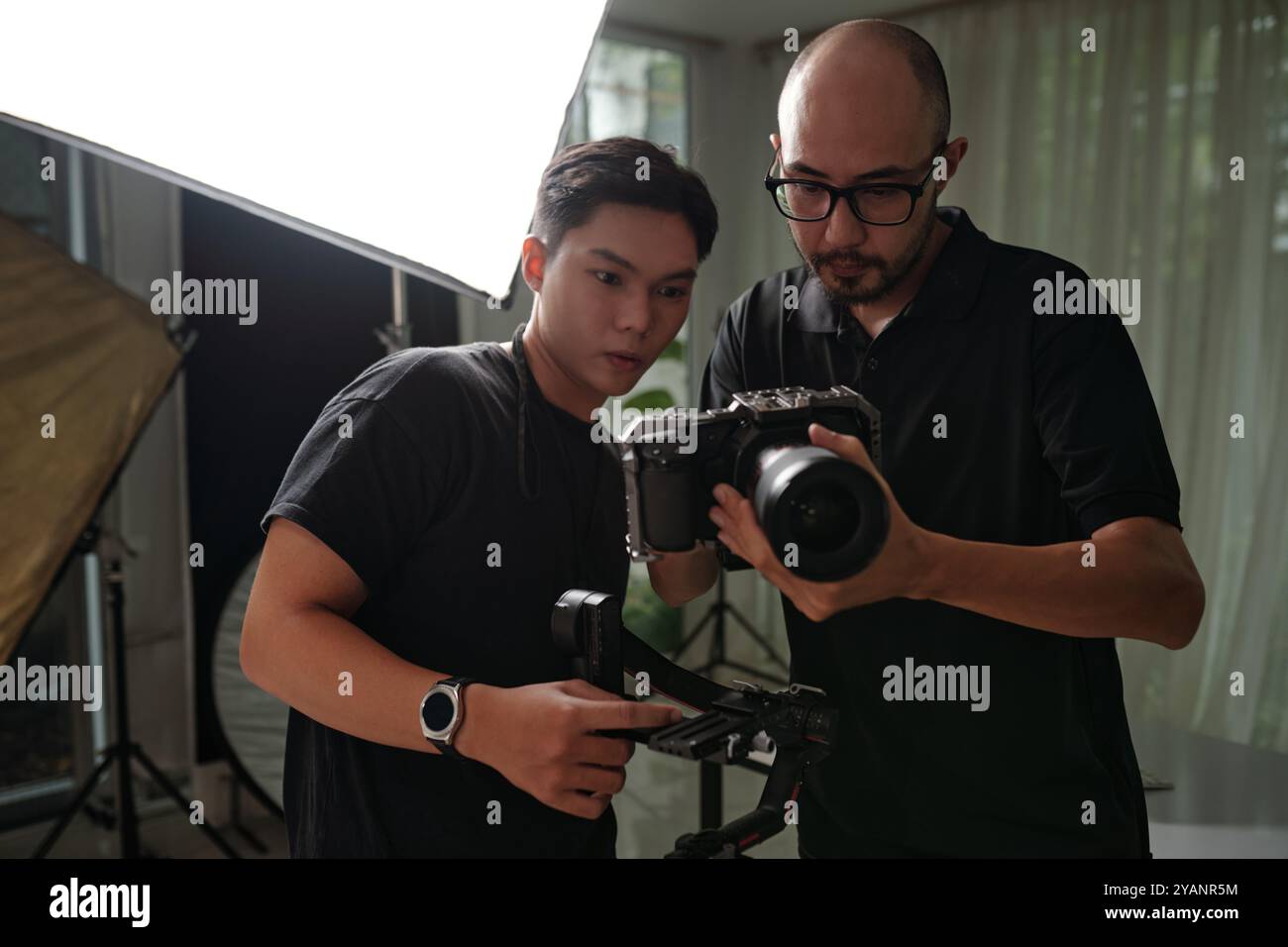 Production crew assistant setting hi-res stock photography and images ...