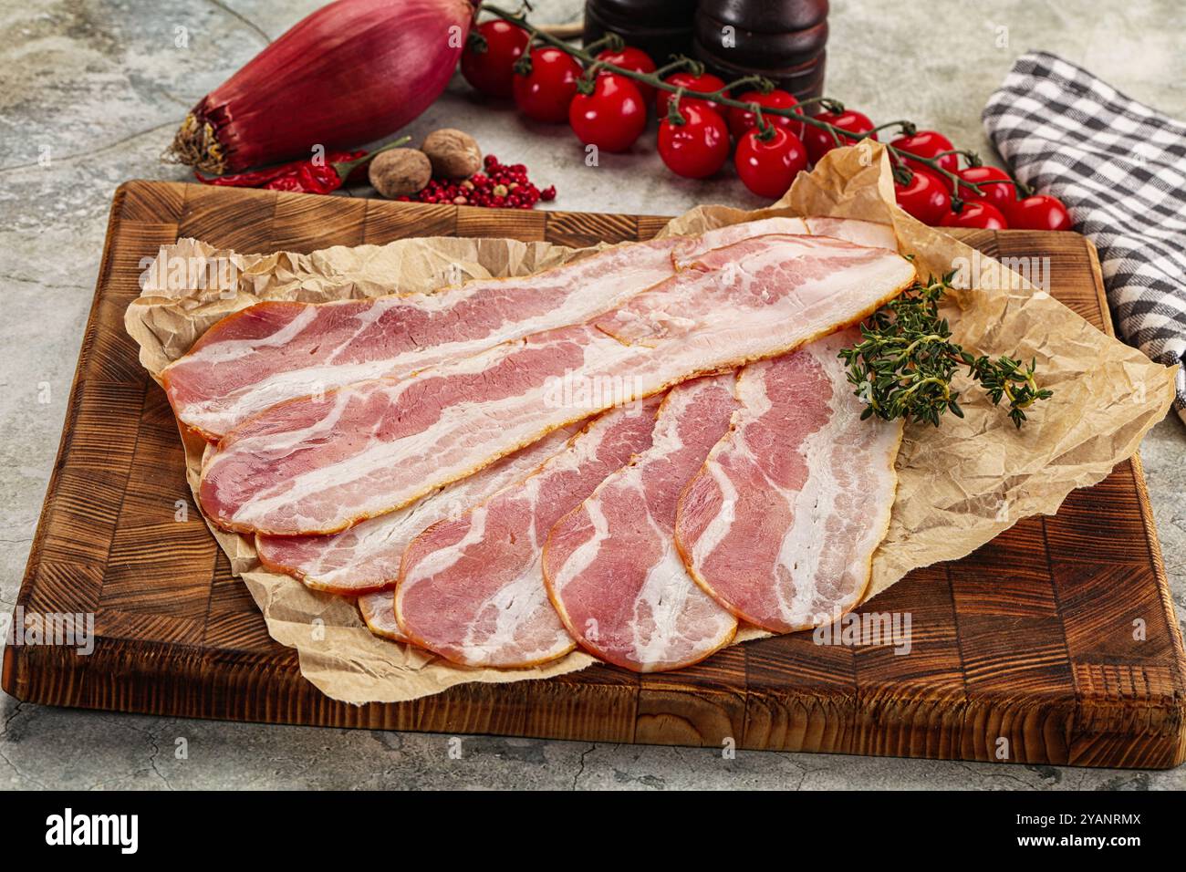 Sliced fat pork bacon over board Stock Photo - Alamy