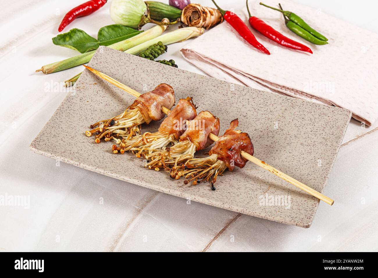 Thai Street foof satay with bacon and mushroom enoki skewer Stock Photo ...