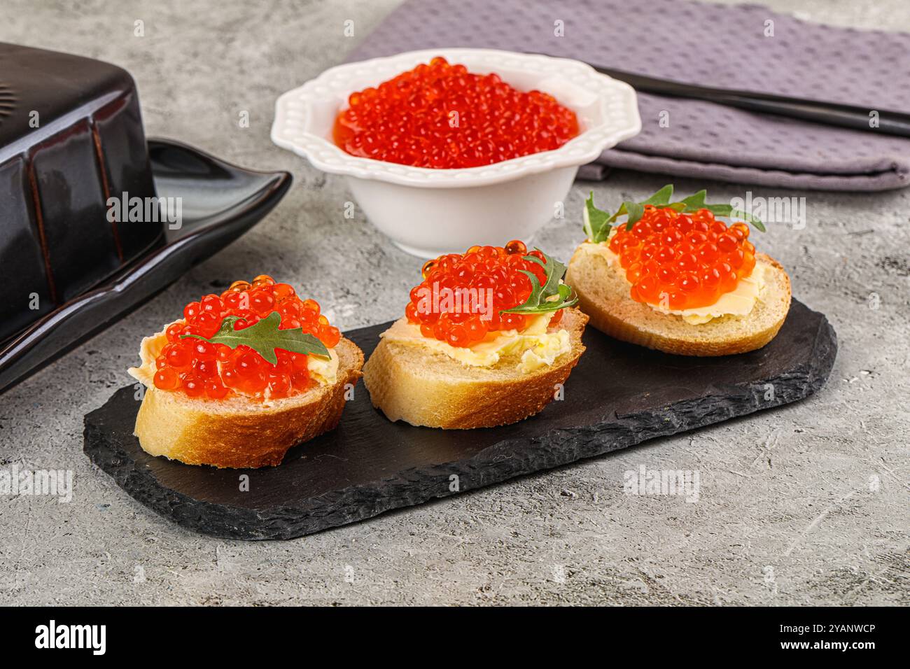 Luxury toast with red caviar and butter Stock Photo - Alamy