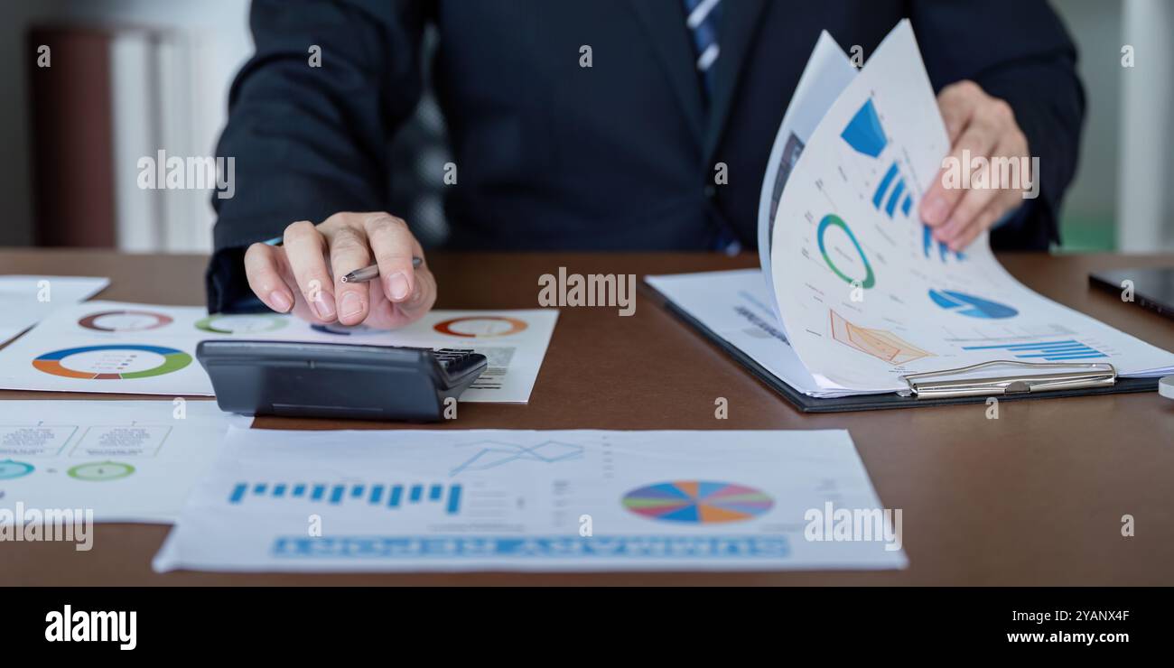 Accountant Analyzing Financial Documents for Data-Driven Business ...
