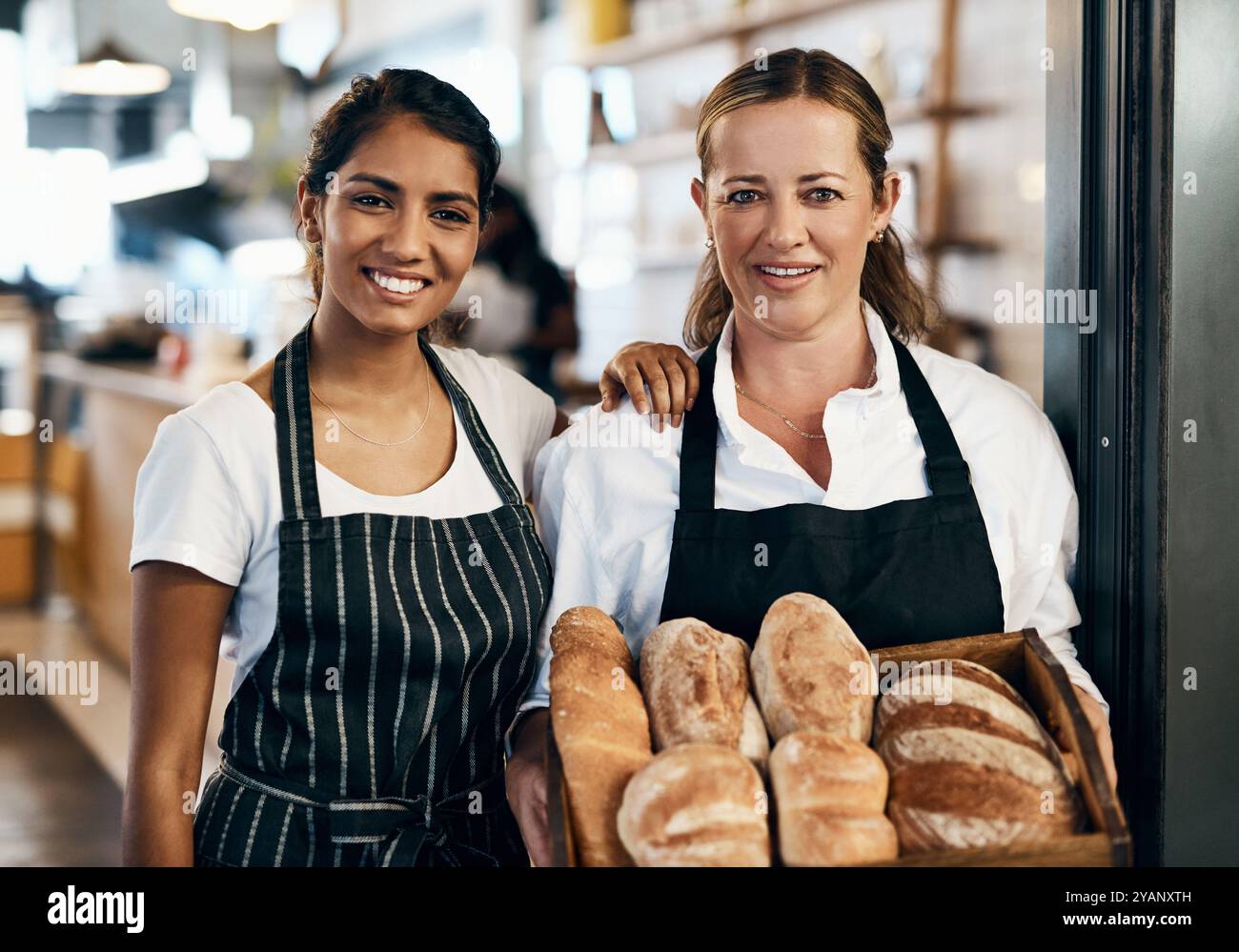 Women, portrait and happy in cafe for bread, catering and recipe ...