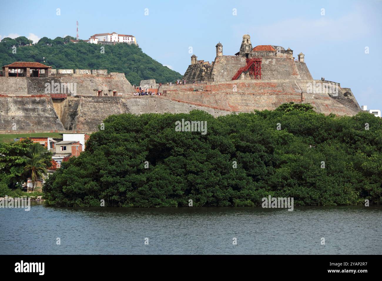 Visitors explore the intricate architecture of the historic Fort San ...