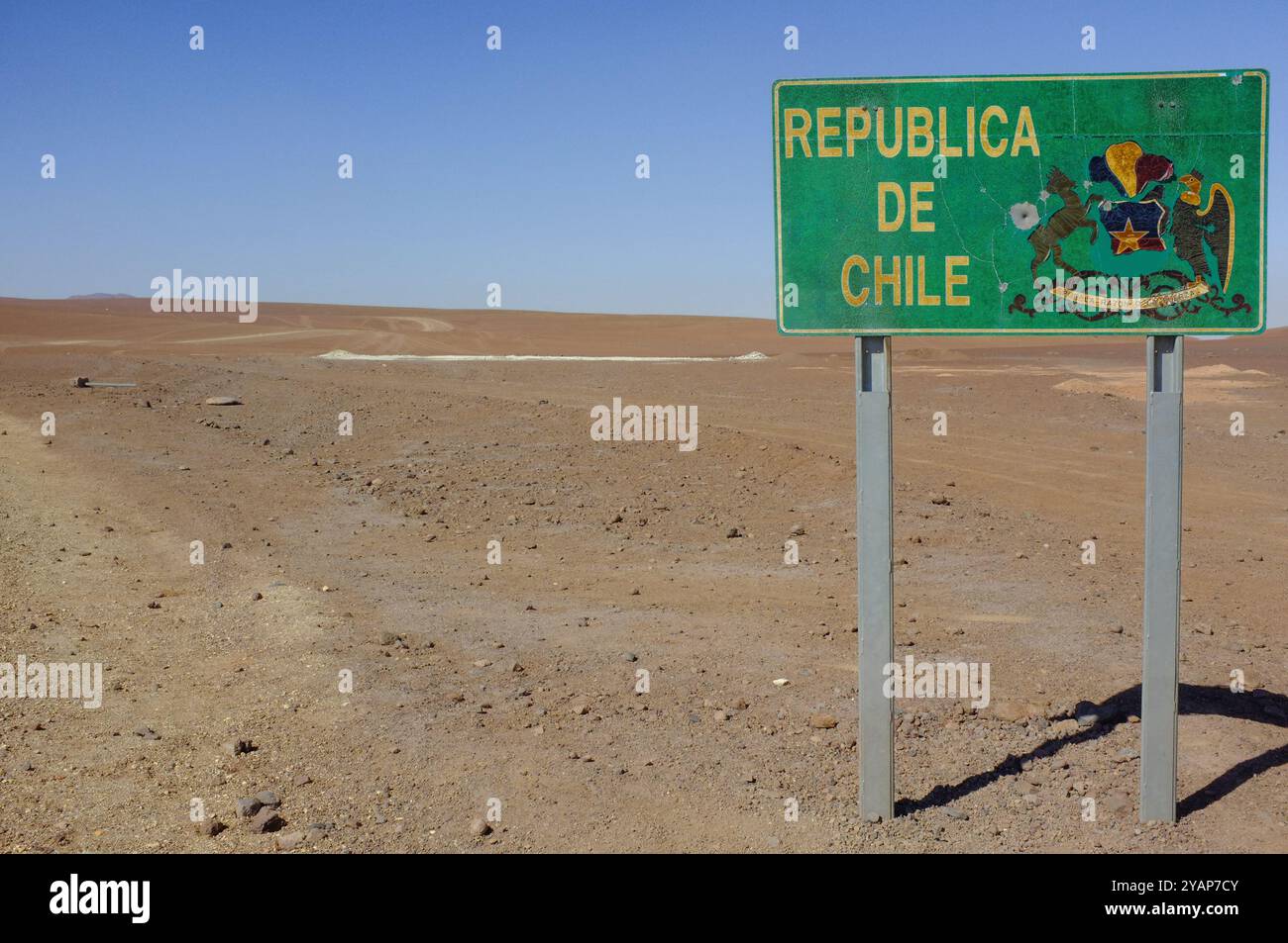 A Border Sign indicating the Republic of Chile prominently stands in ...