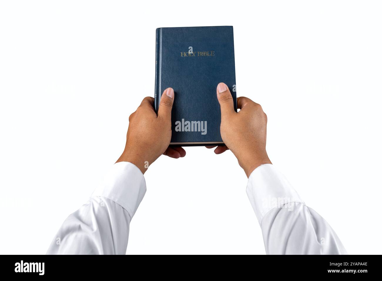 Christian man holding a holy bible in his hand. Symbol of faith in God ...