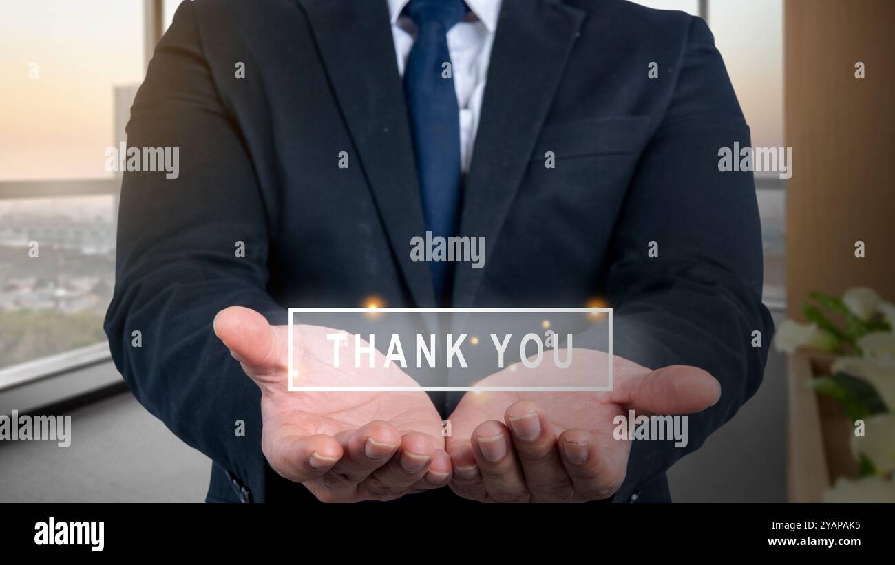 Businessman showing word a thank you on his hands. Concept of gratitude ...
