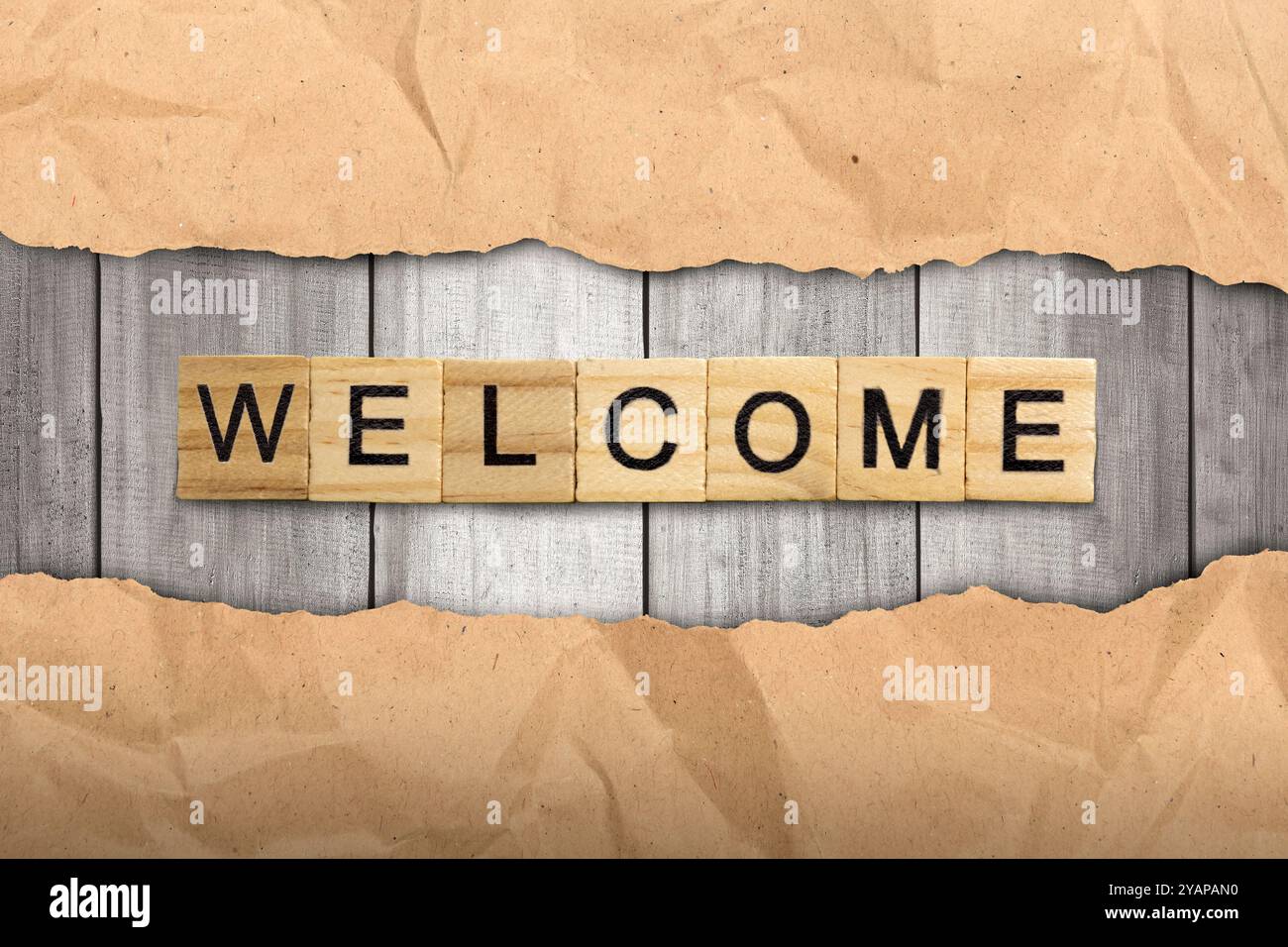 Row of wooden blocks showing word "Welcome" written on it. Welcome ...