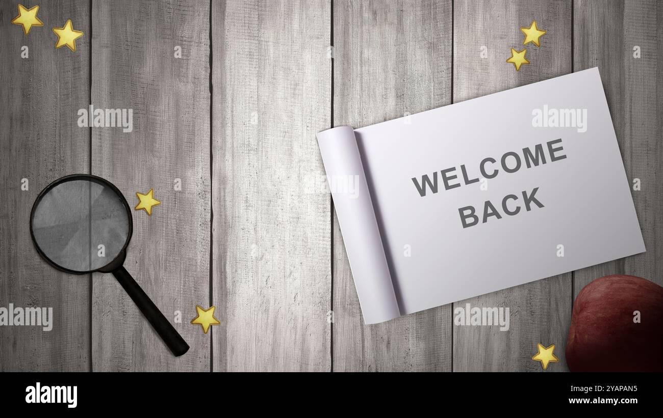 White paper showing word "Welcome back" written on it. Welcome greeting ...