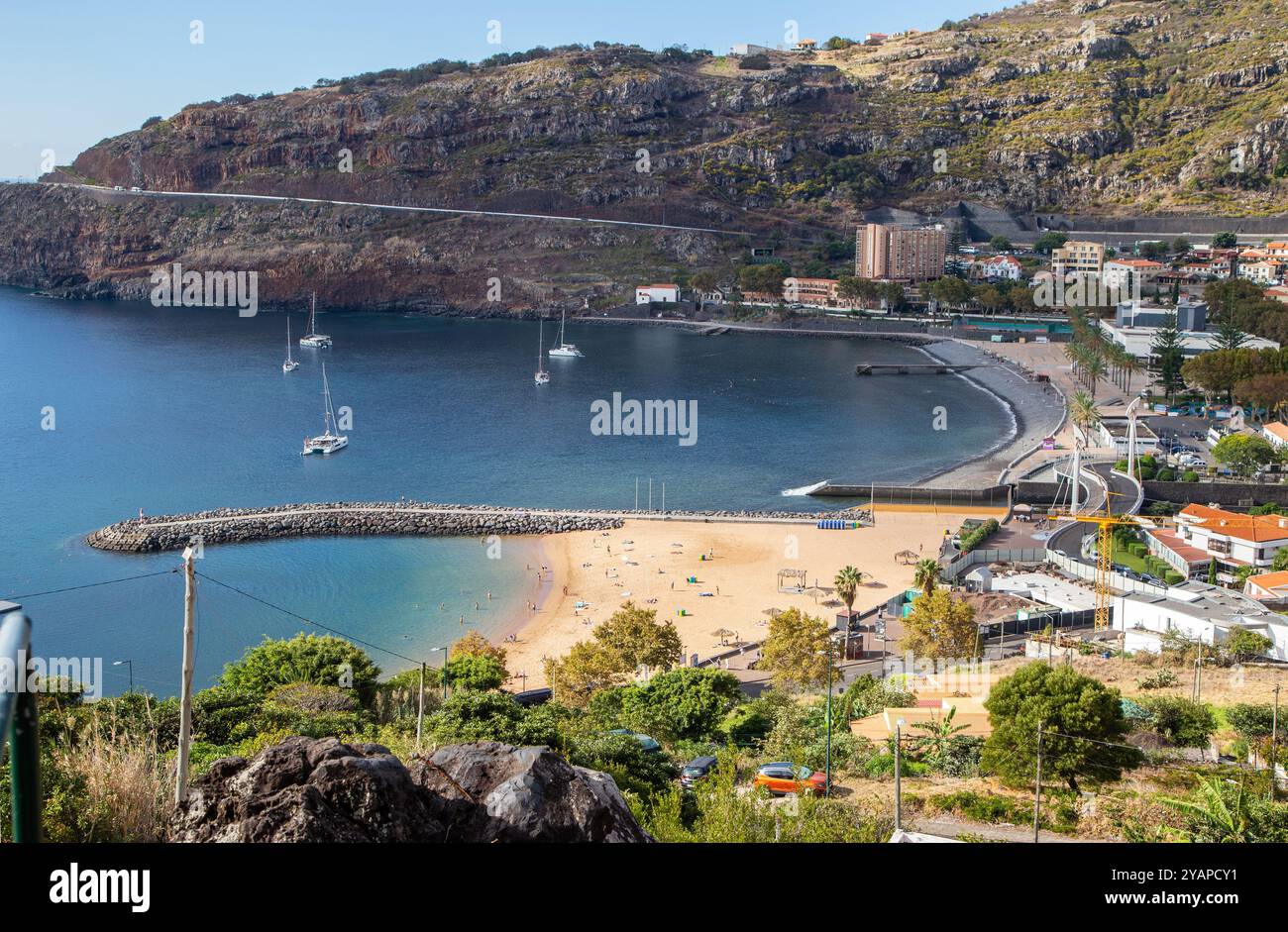 Yachts and boats in the harbour and marina at Machico, the second ...