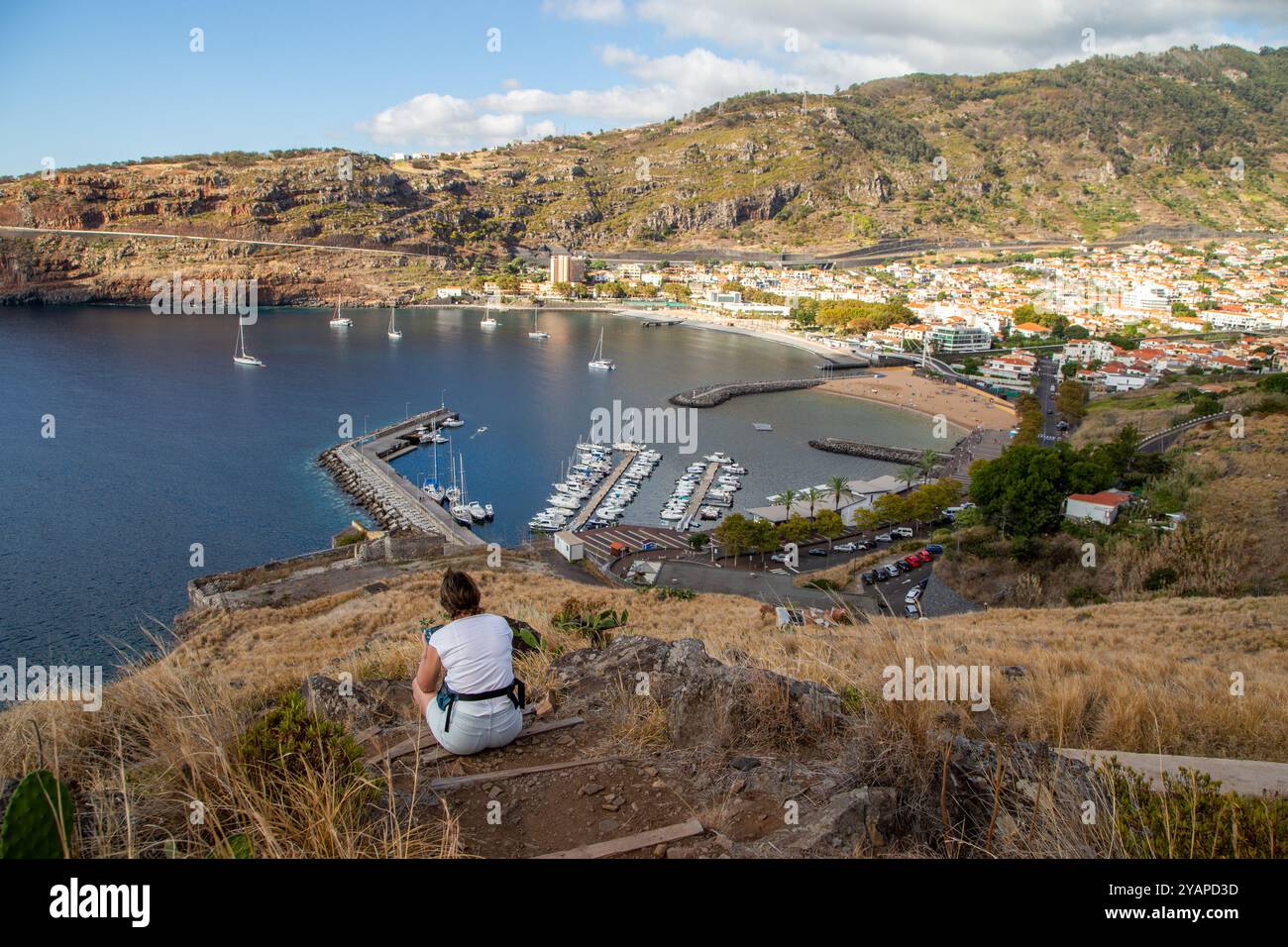Yachts and boats in the harbour and marina at Machico, the second ...