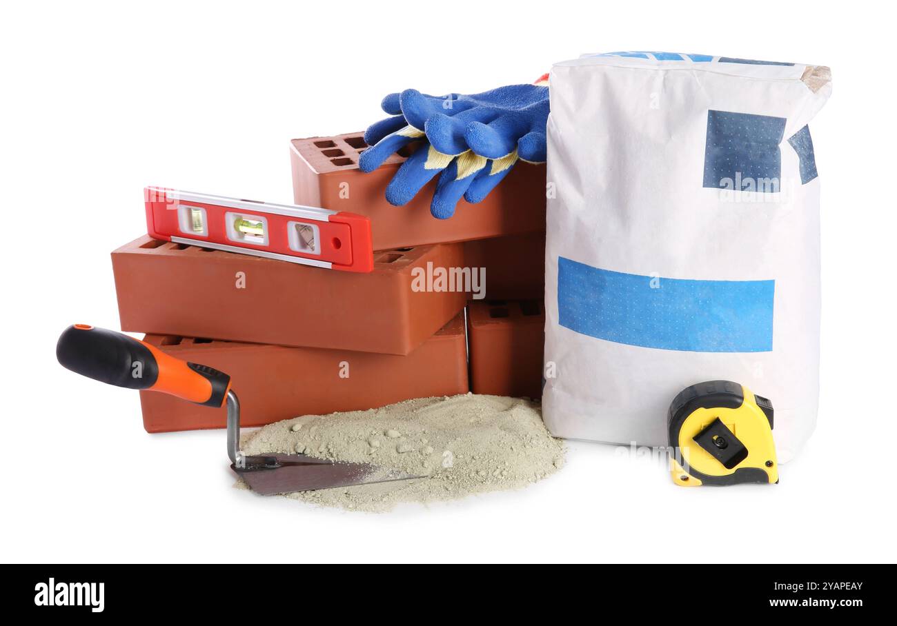 Different building materials and construction tools isolated on white ...