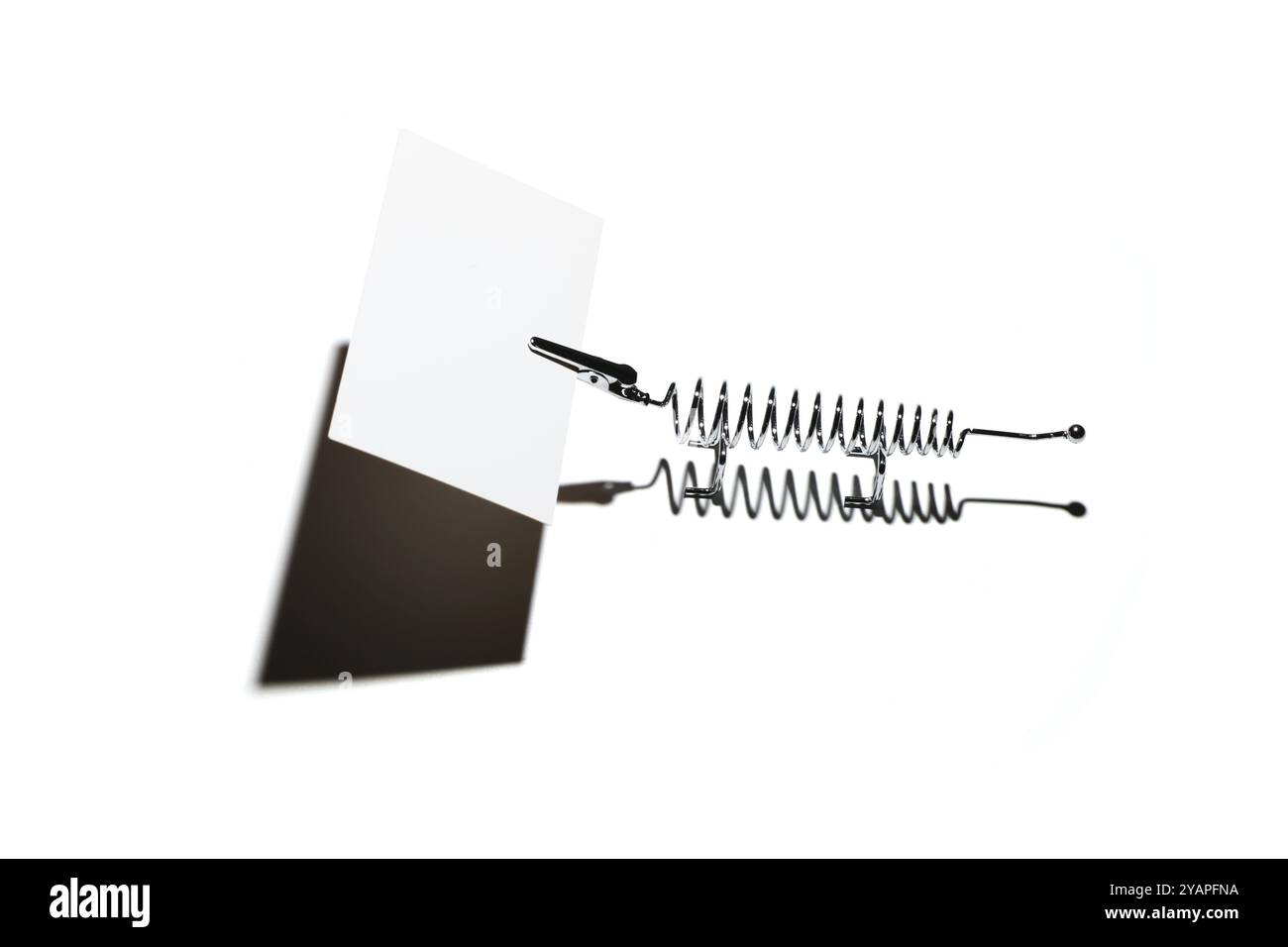 Paper Clip on White Paper Stock Photo - Alamy