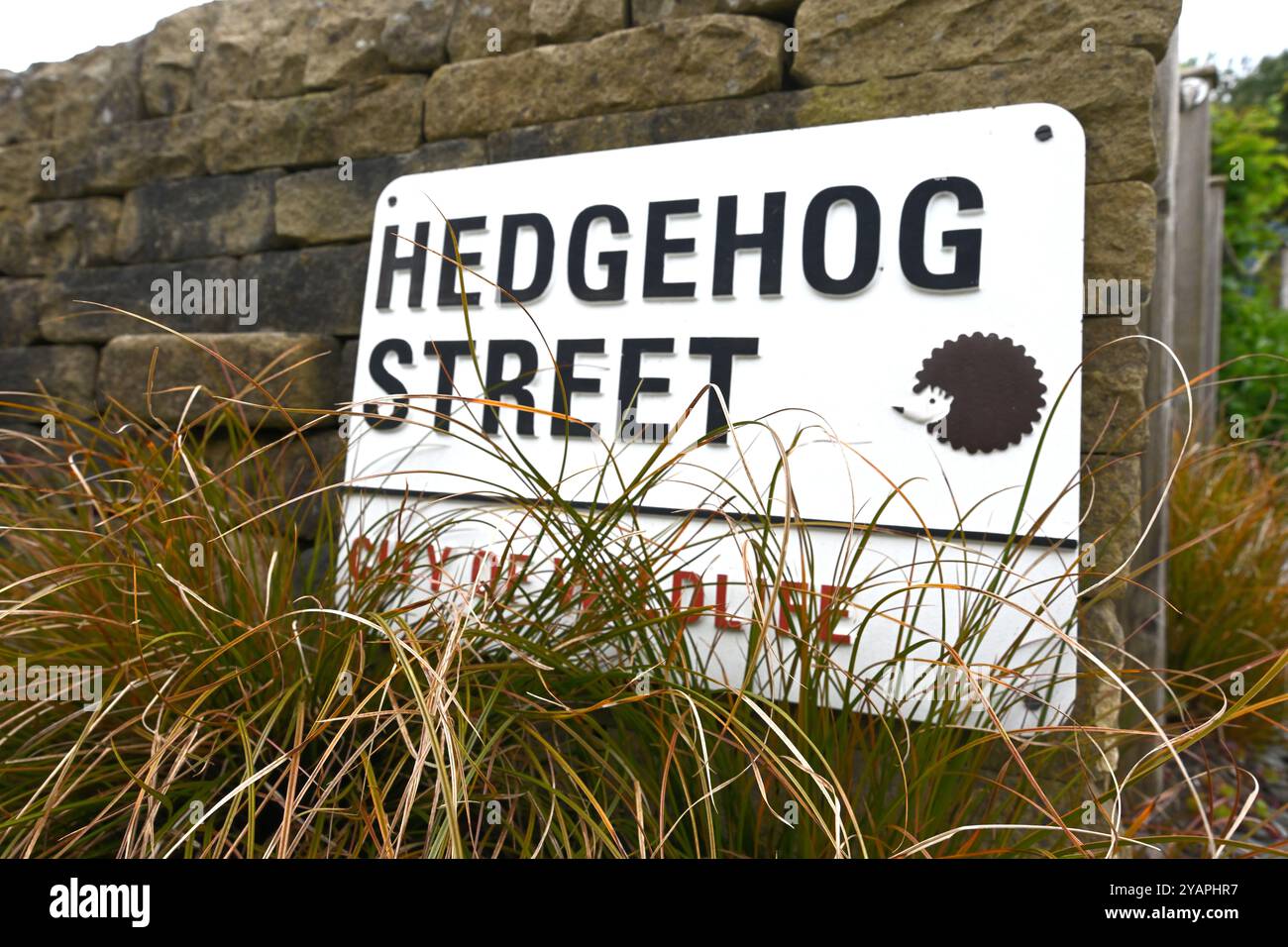 Hedgehog Street sign at RHS Garden Harlow Carr UK Stock Photo - Alamy