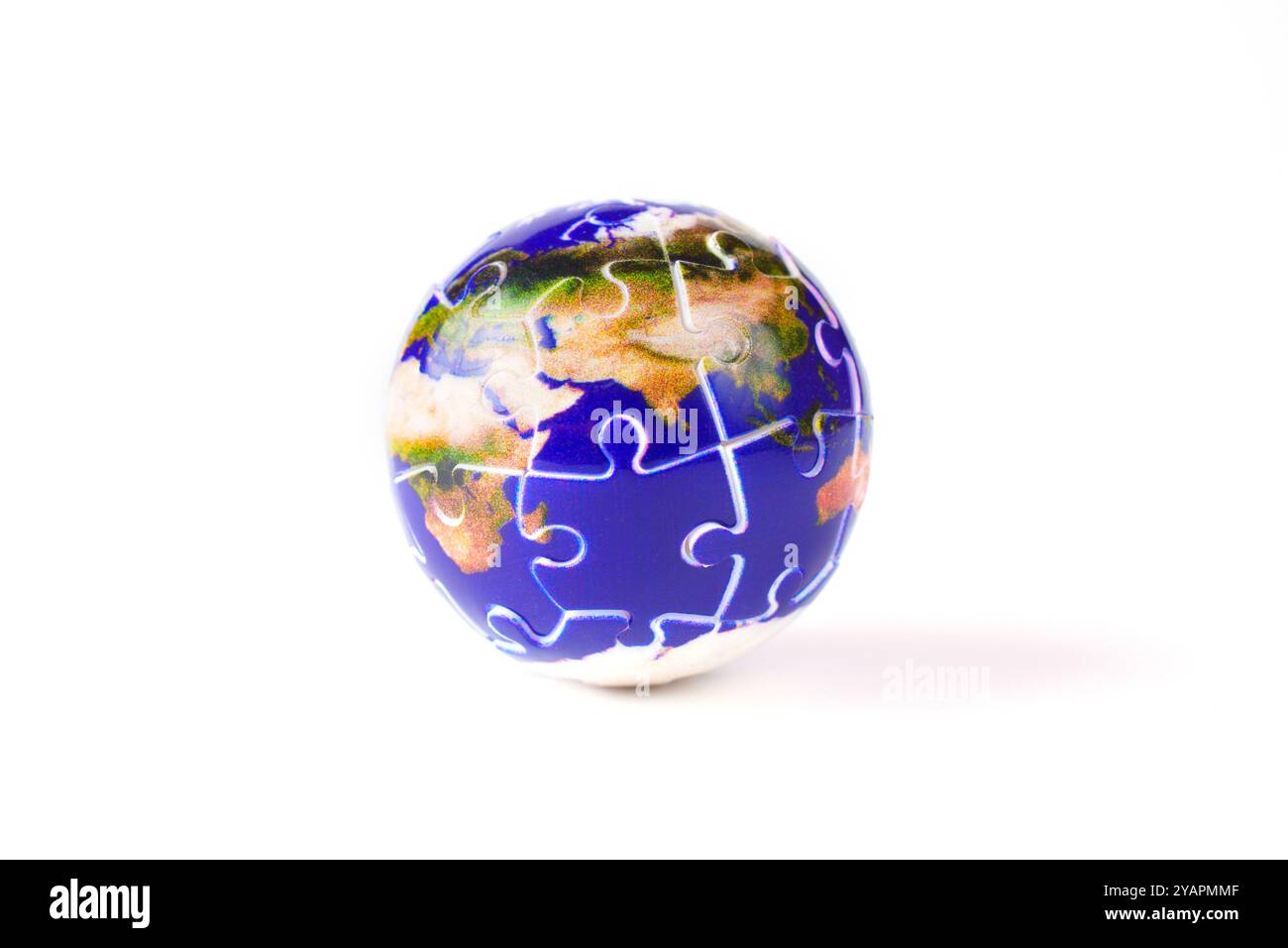 Globe designed as a 3D puzzle, symbolizing global connectivity and ...