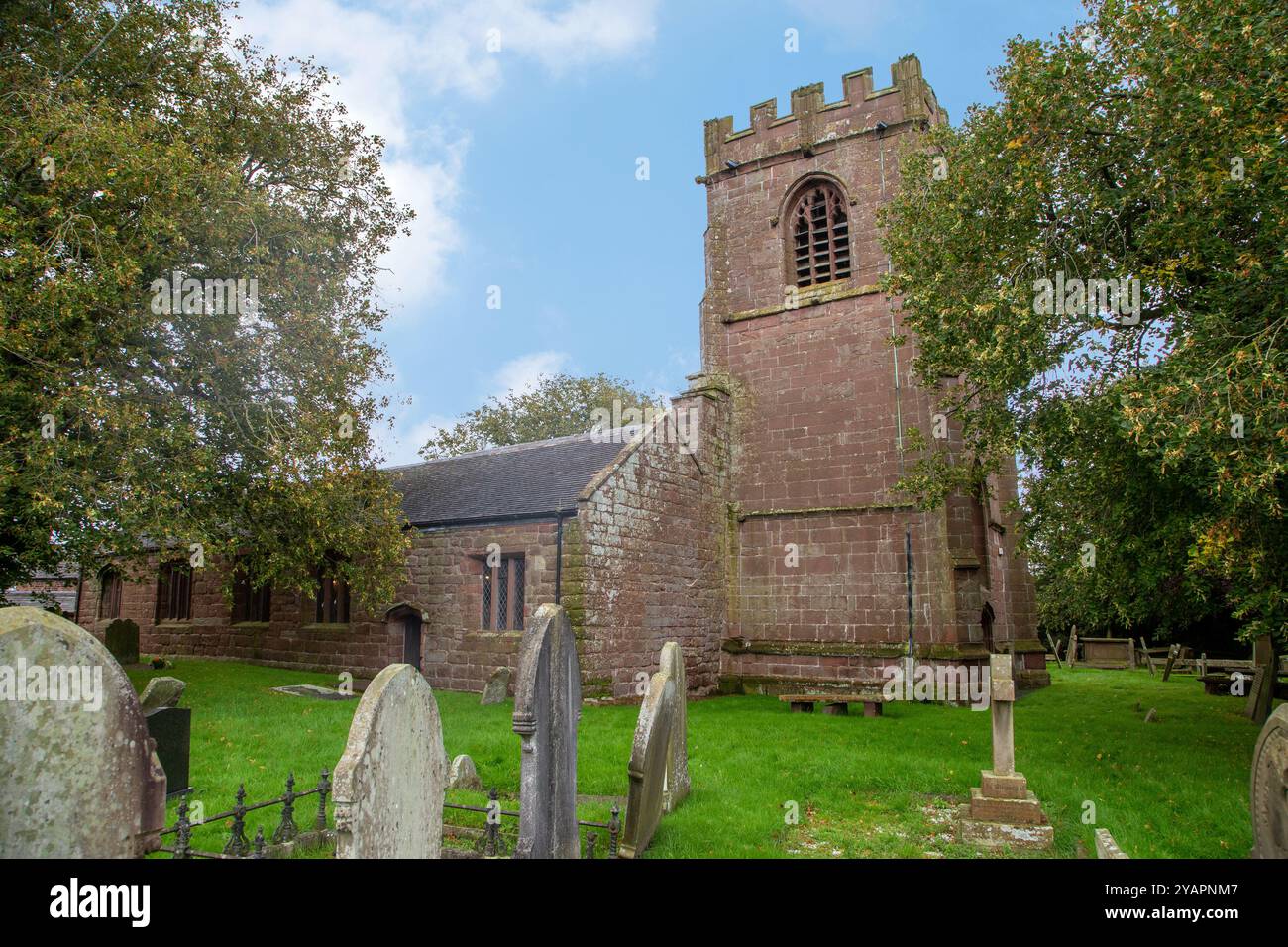 The red sandstone 14 th century St Michael's Church Shotwick the Wirral ...