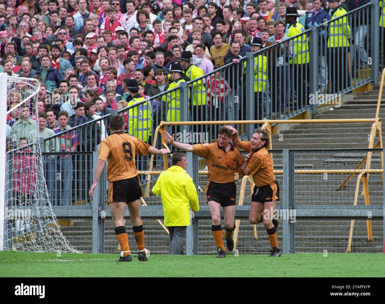 Wolves footballer Andy Mutch celebrates his goal with Steve Bull and ...
