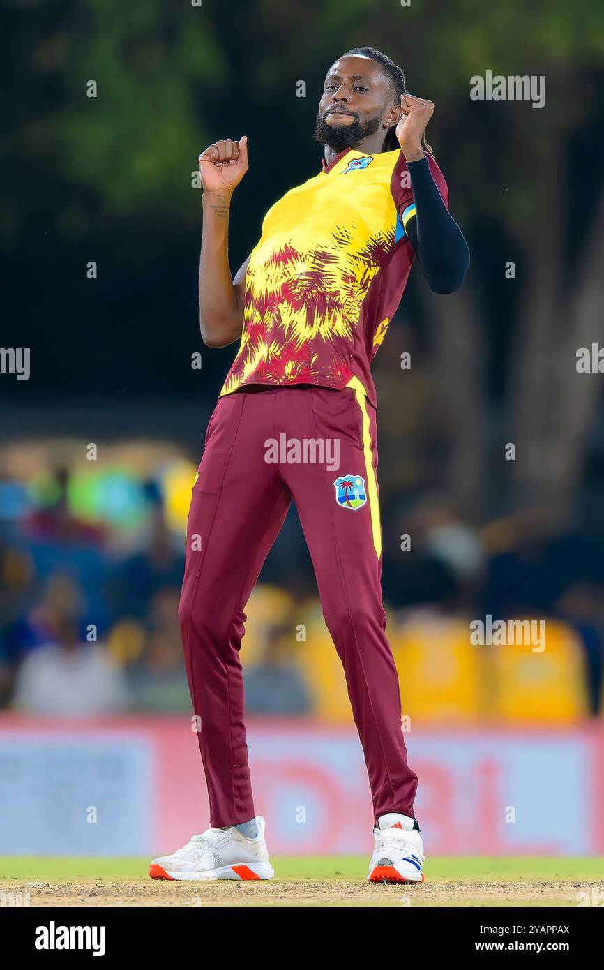 West Indies' Shamar Springer celebrates the wicket of Sri Lanka's Kusal ...