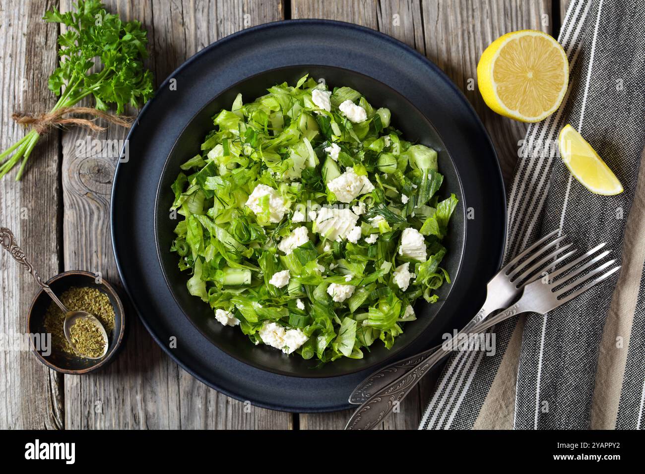 Classic Greek lettuce salad sprinkled with crumbled feta cheese ...