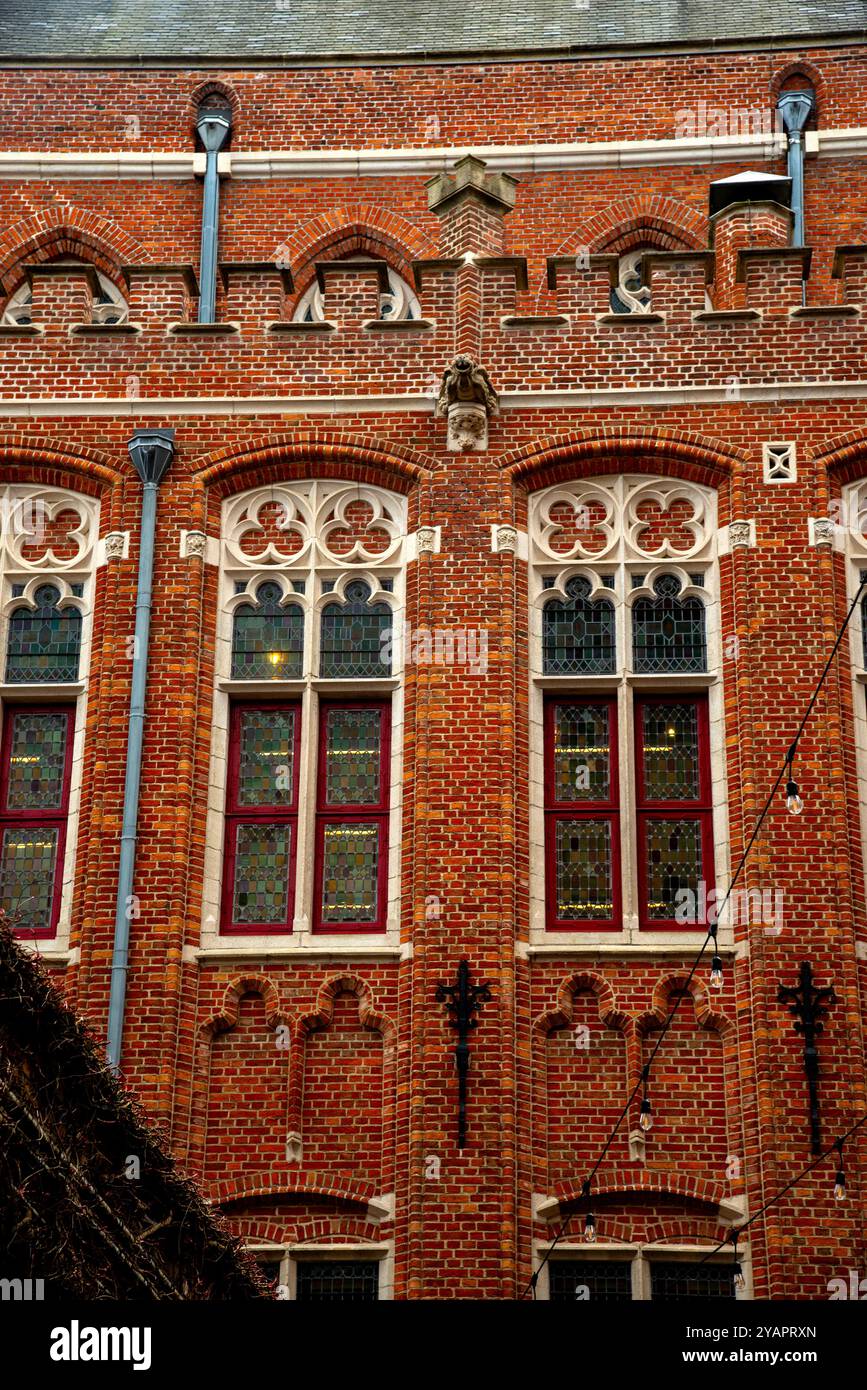 Gothic arches and crenellations, stone tracery and trefoils, blind ...