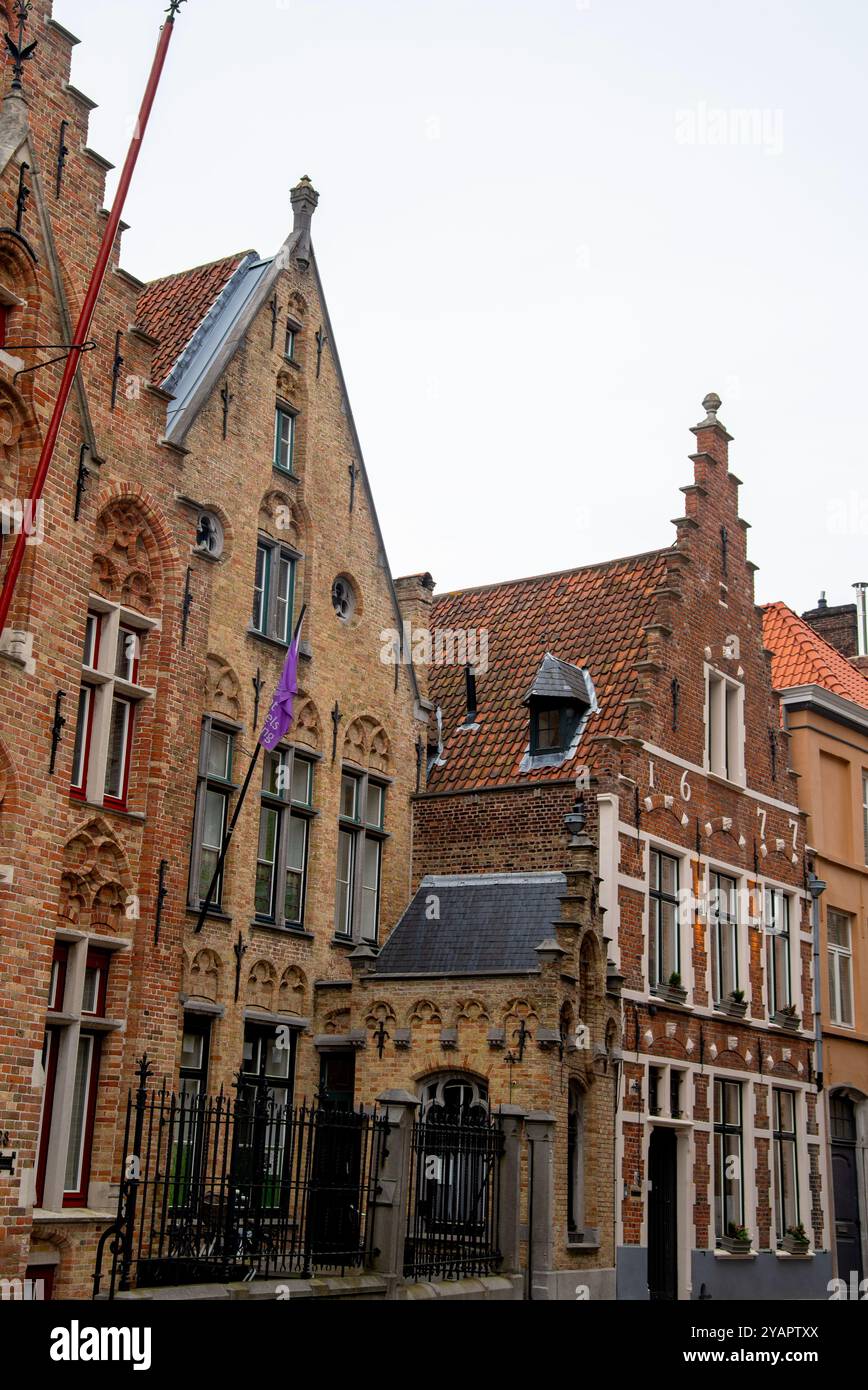 Brick Gothic tracery window pediments in medieval Bruges, Belgium Stock ...