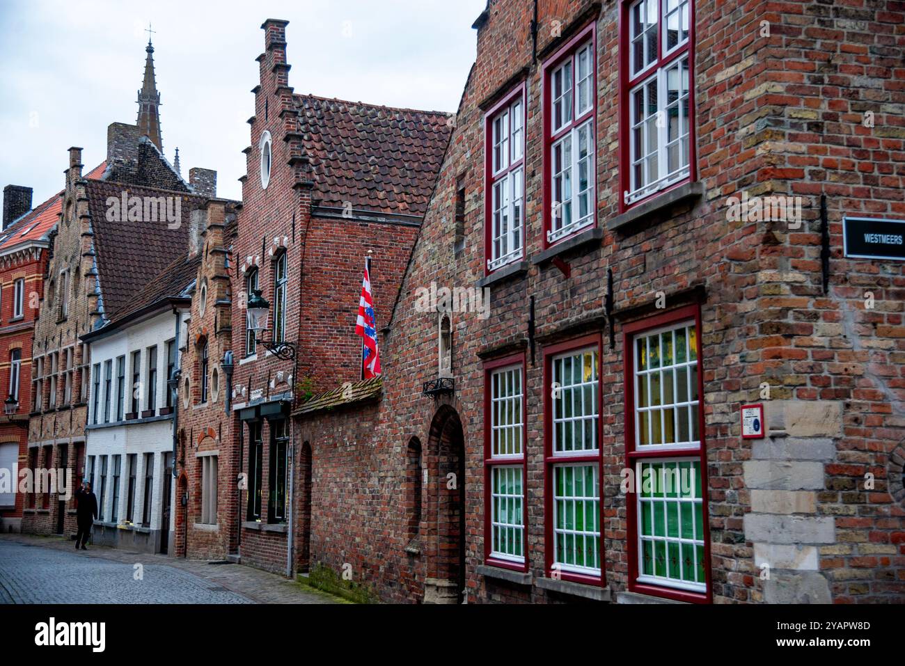 Gothic spire of Church of Our Lady and brick stepped gables in Bruges ...