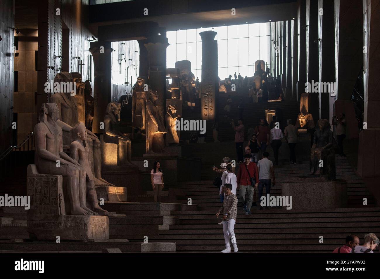 Giza, Egypt. 15th Oct, 2024. Visitors walk past ancient Egyptian ...