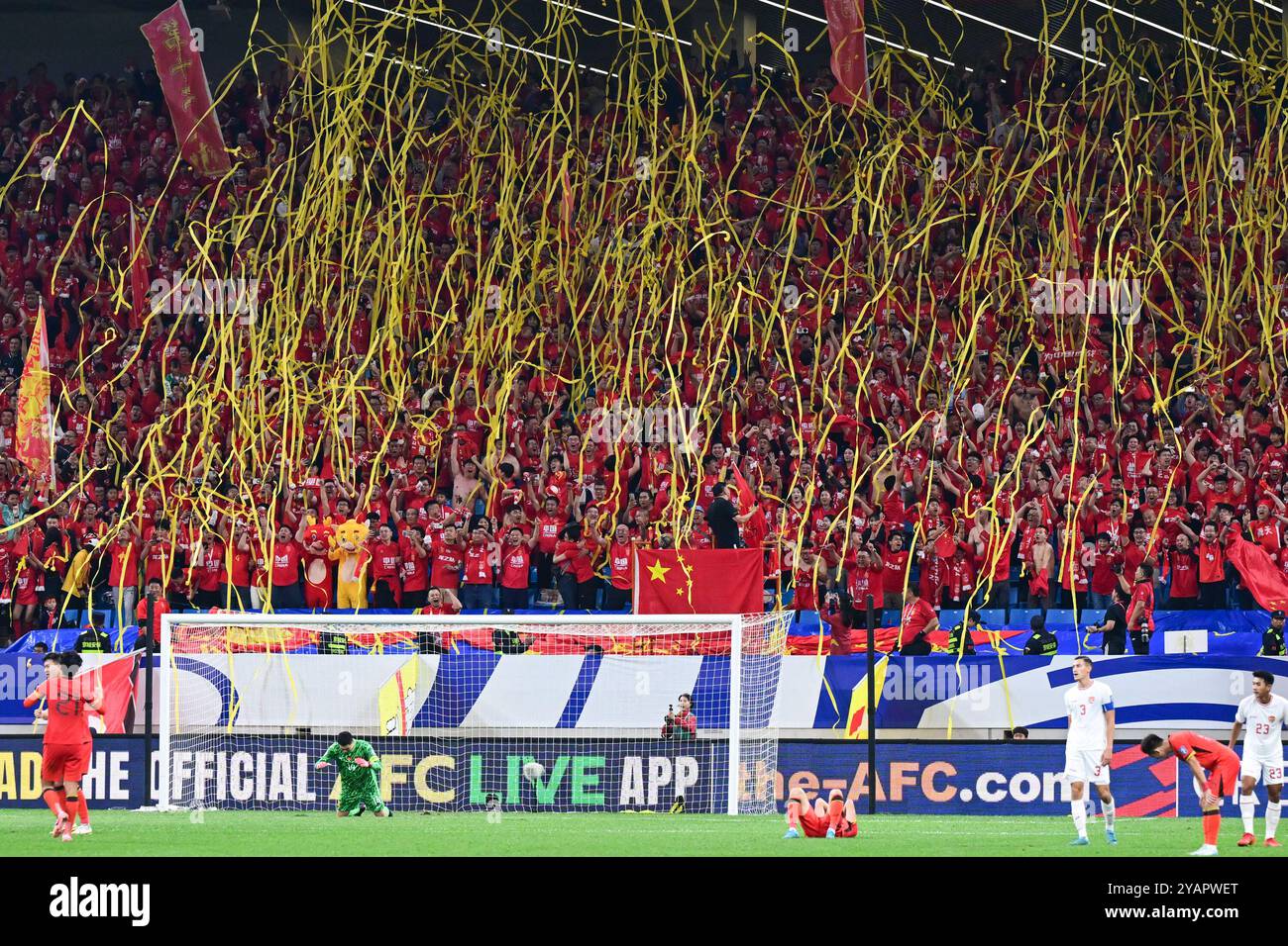 QINGDAO, CHINA - OCTOBER 15, 2024 - Fans cheer for China during their ...