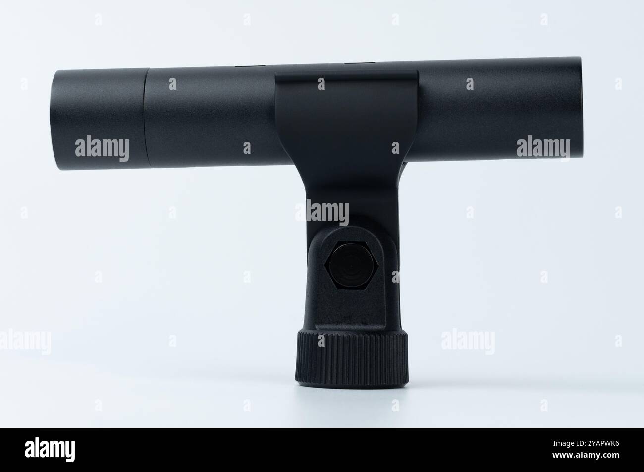Cylindrical black microphone side view isolated on white studio ...