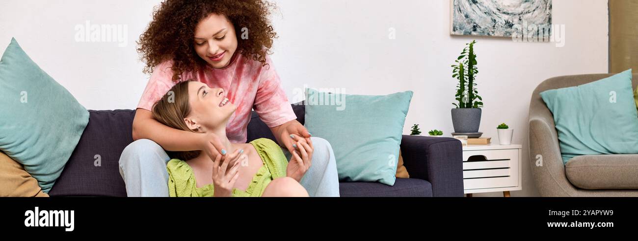 A beautiful young couple shares laughter and affection in a bright ...