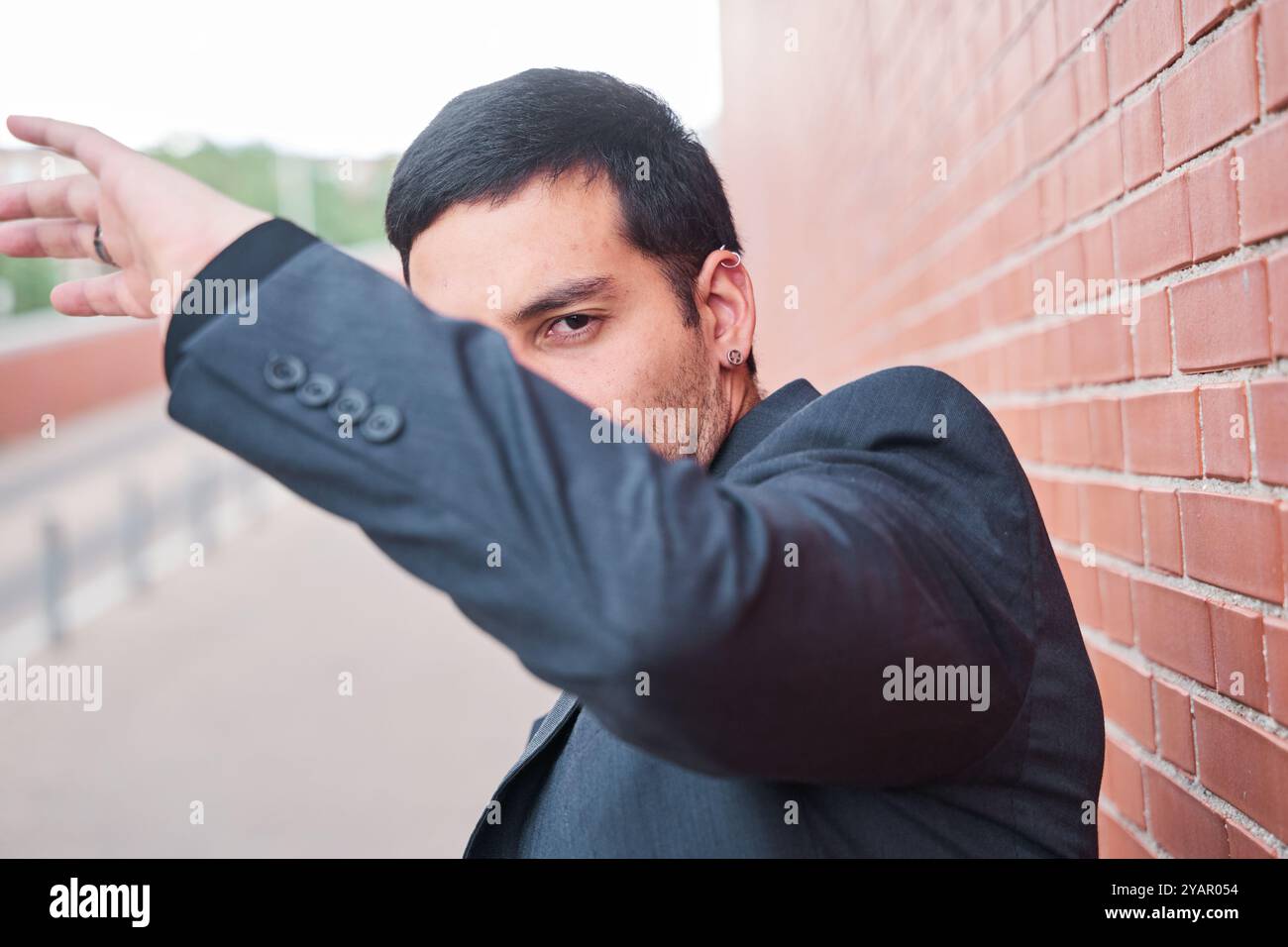 Happy man putting arm hi-res stock photography and images - Alamy