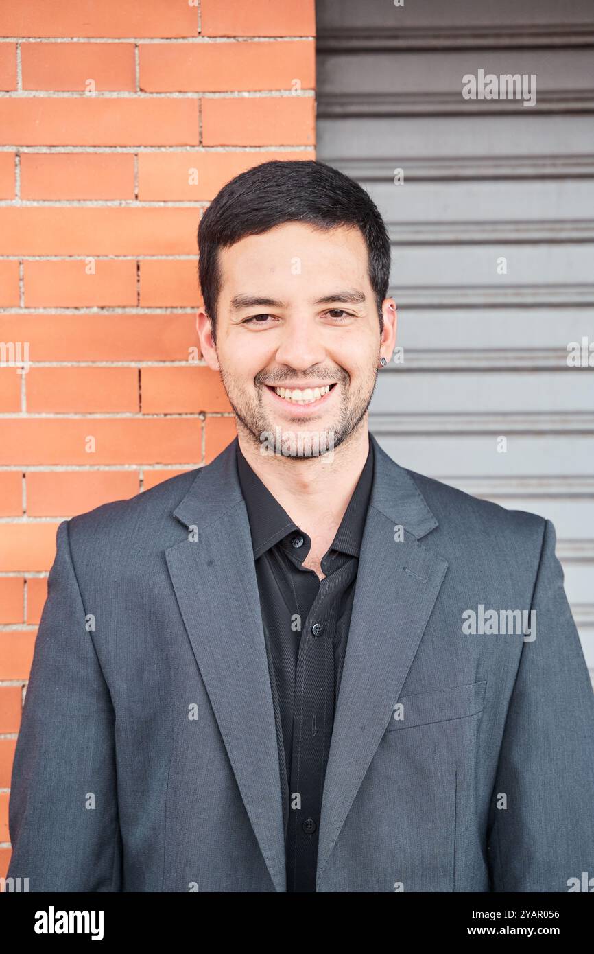 portrait of a latin man smiling and showing his white teeth Stock Photo ...
