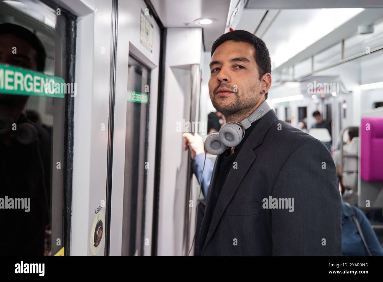 Businessman riding subway train hi-res stock photography and images - Alamy