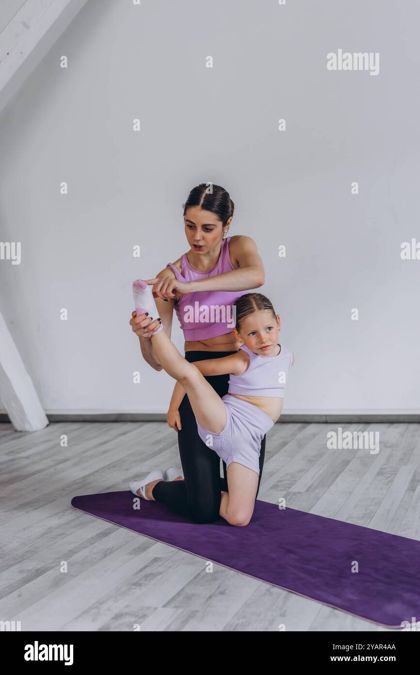 children's gymnastics and muscle stretching exercises. High quality ...