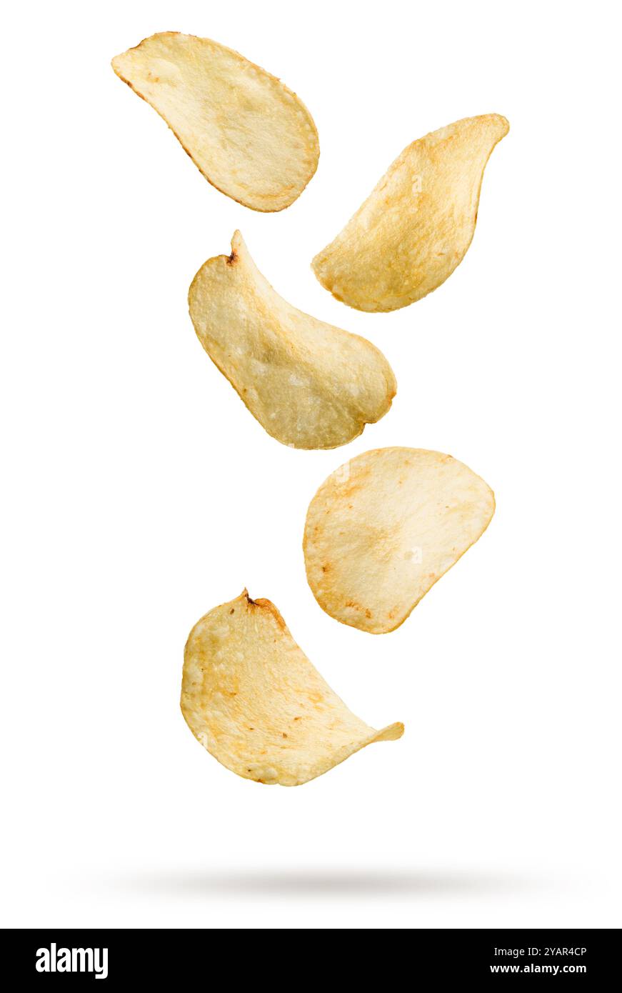 Tasty potato chips falling Cut Out Stock Images & Pictures - Alamy