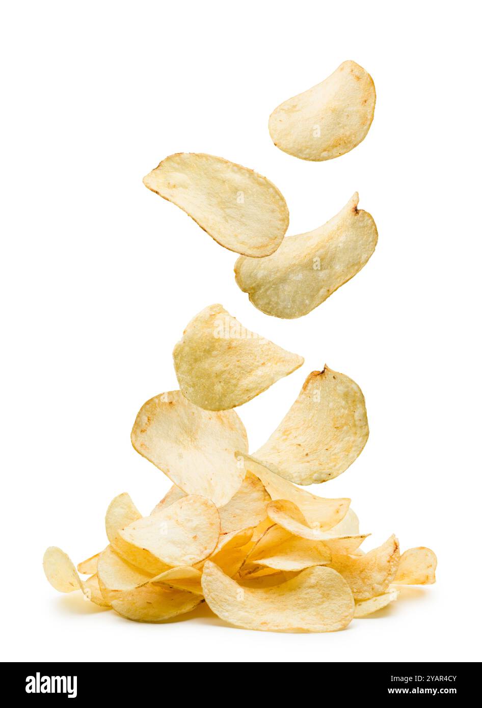 Potato chips falling on pile on white background Stock Photo - Alamy
