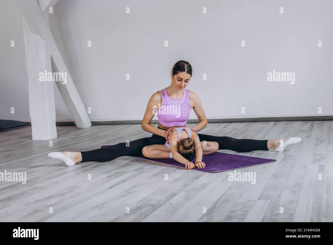 children's gymnastics and muscle stretching exercises. High quality ...