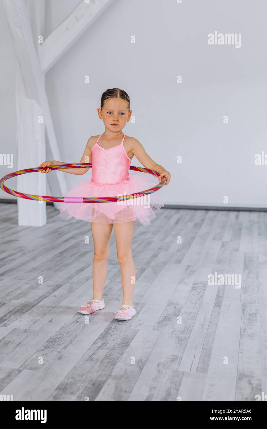 Baby ballet studio. Little ballerina with a coach in dance class ...
