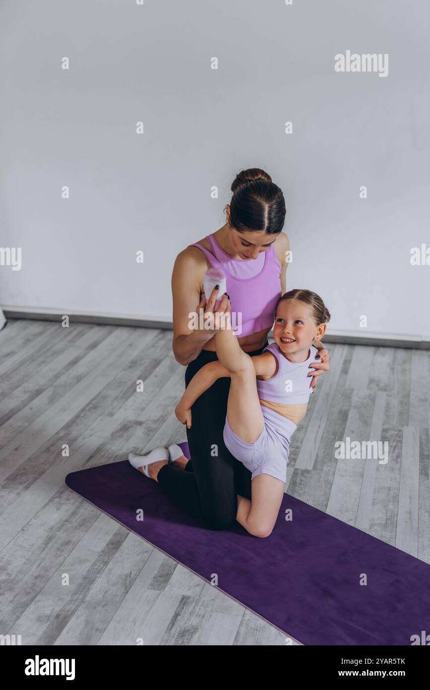 children's gymnastics and muscle stretching exercises. High quality ...