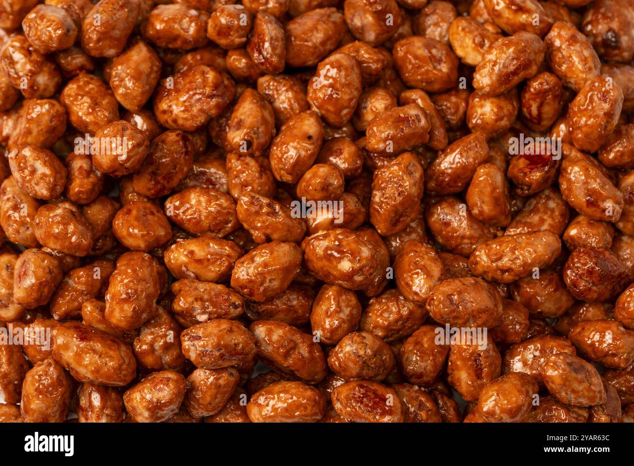 Tasty sweet roasted peanuts as a background Stock Photo - Alamy
