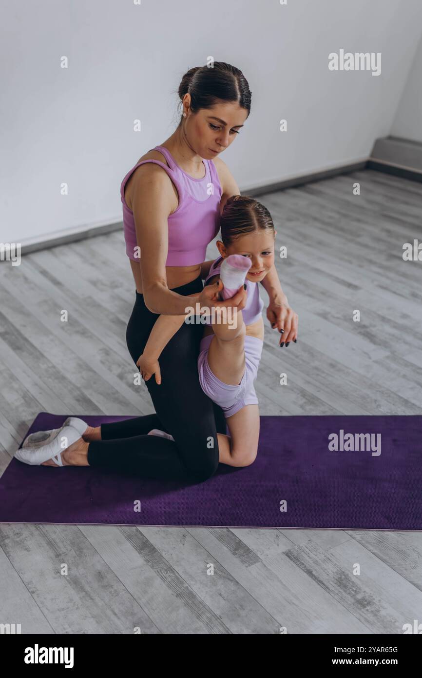 children's gymnastics and muscle stretching exercises. High quality ...