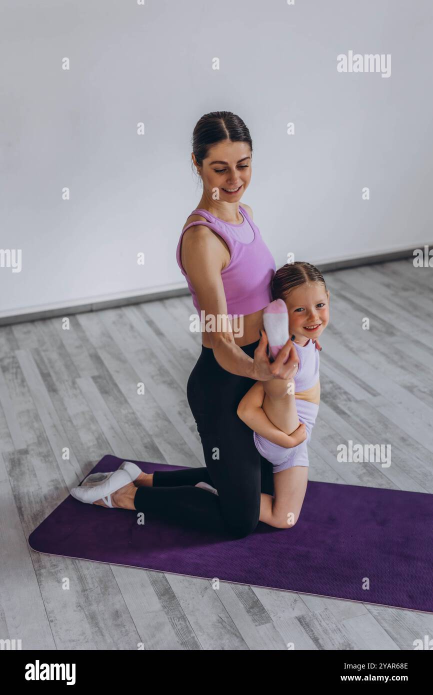 children's gymnastics and muscle stretching exercises. High quality ...