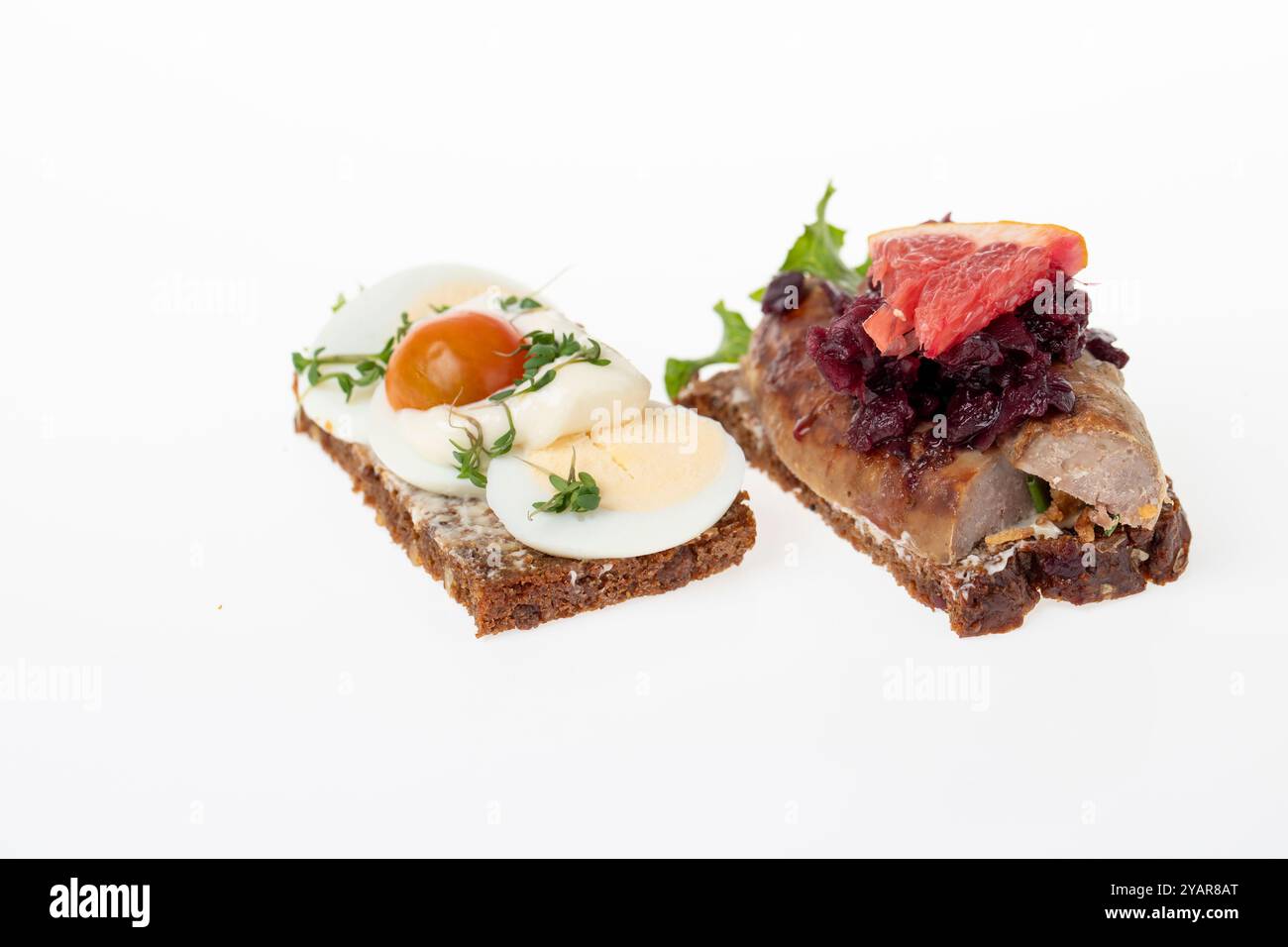 selection of open-faced Danish sandwiches (Smørrebrød) on dark rye ...