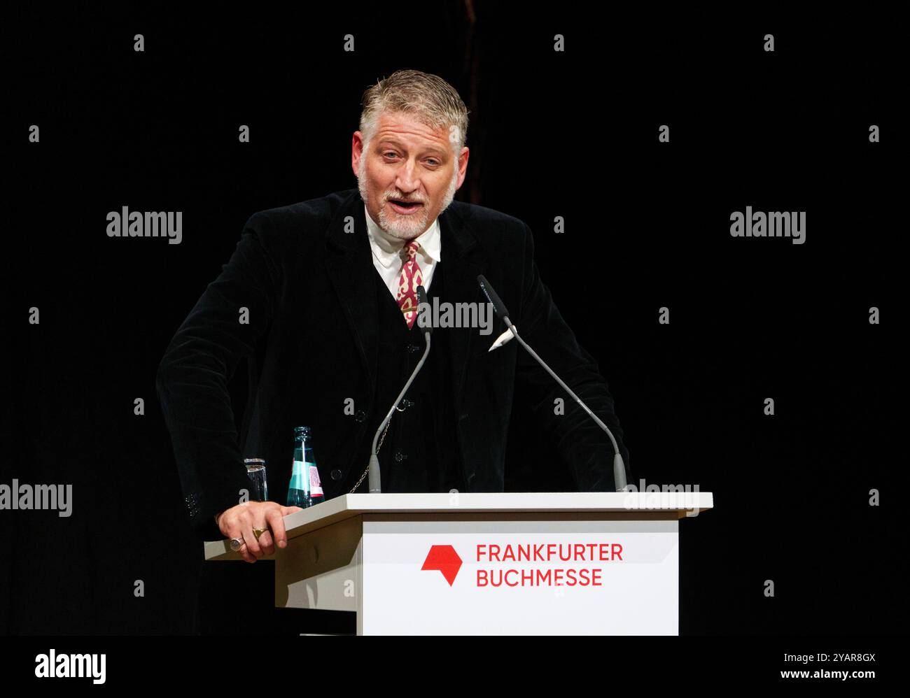 Italian Minister of Culture, Alessandro Giuli, delivers a speech during ...