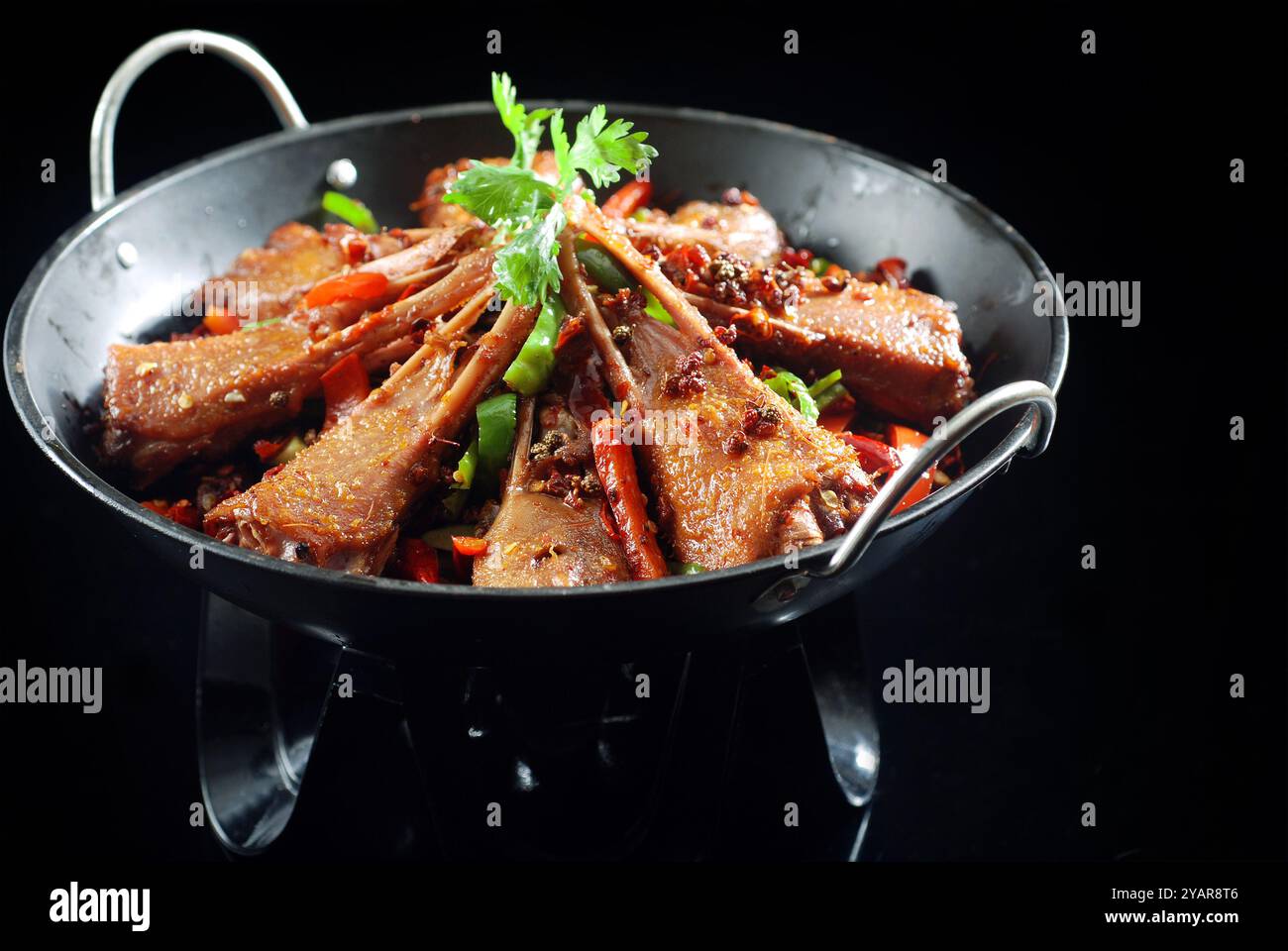 Griddle Cooked spicy duck head Stock Photo - Alamy