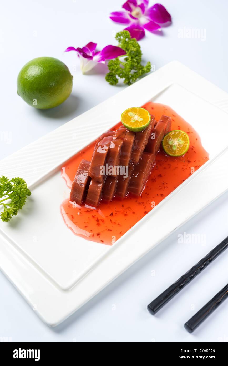 Steamed Lotus Root Stuffed with Glutinous Rice Stock Photo - Alamy