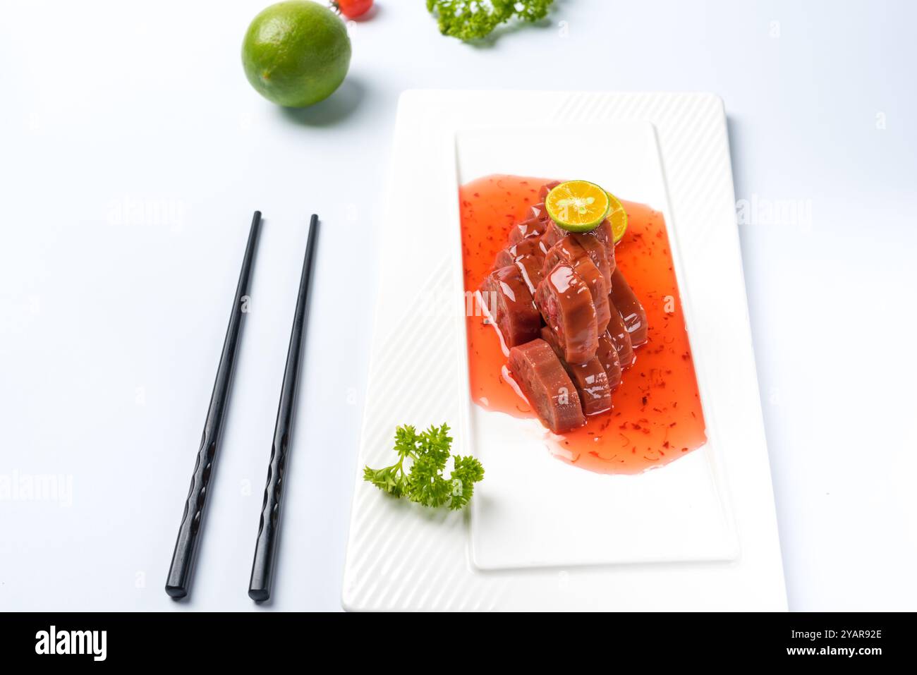 Steamed Lotus Root Stuffed with Glutinous Rice Stock Photo - Alamy