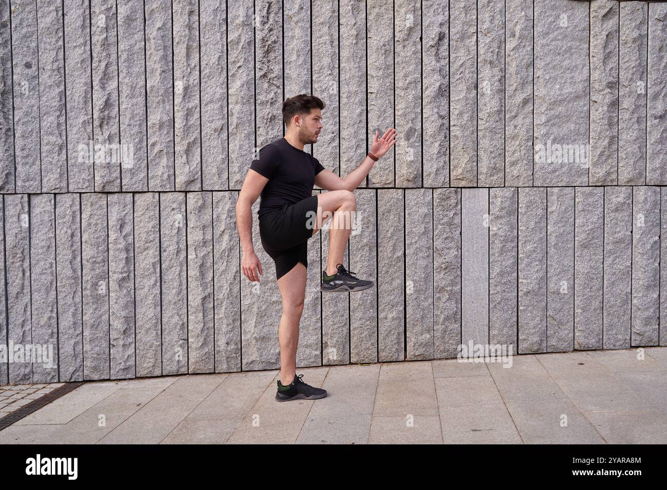 Man running up wall hi-res stock photography and images - Alamy